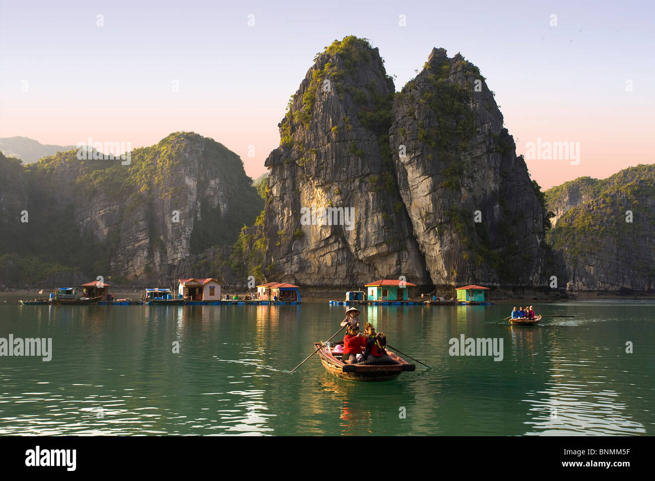 Vietnam Asia Far East Halong bay cliff formation rock cliff coast boat ...