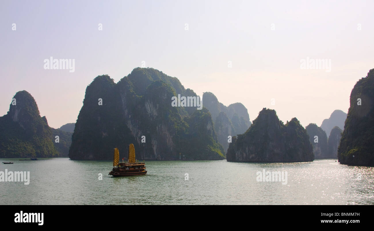 Vietnam Asia Far East Halong bay cliff formation rock cliff coast boat ...