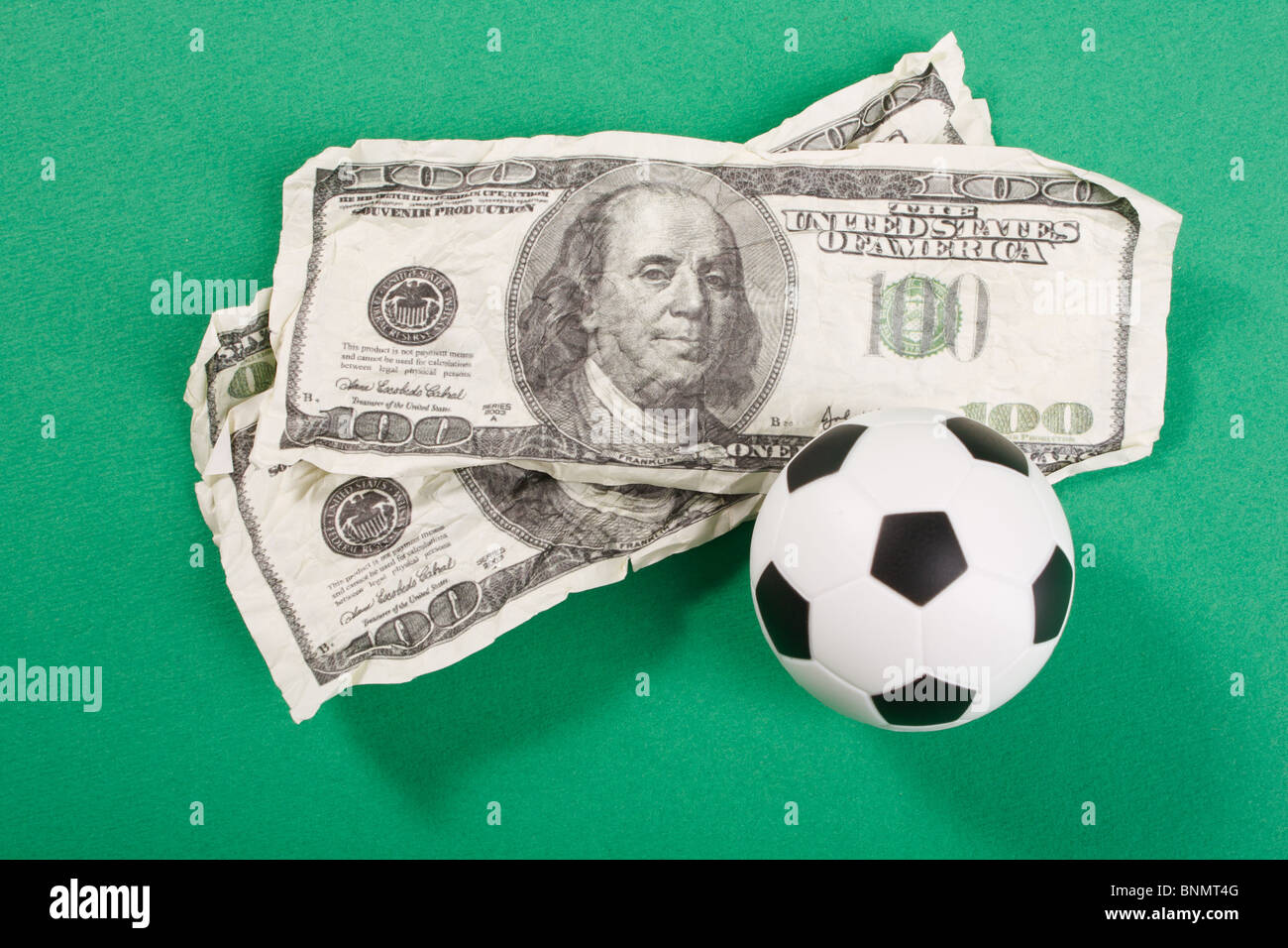 football and dollars Stock Photo - Alamy