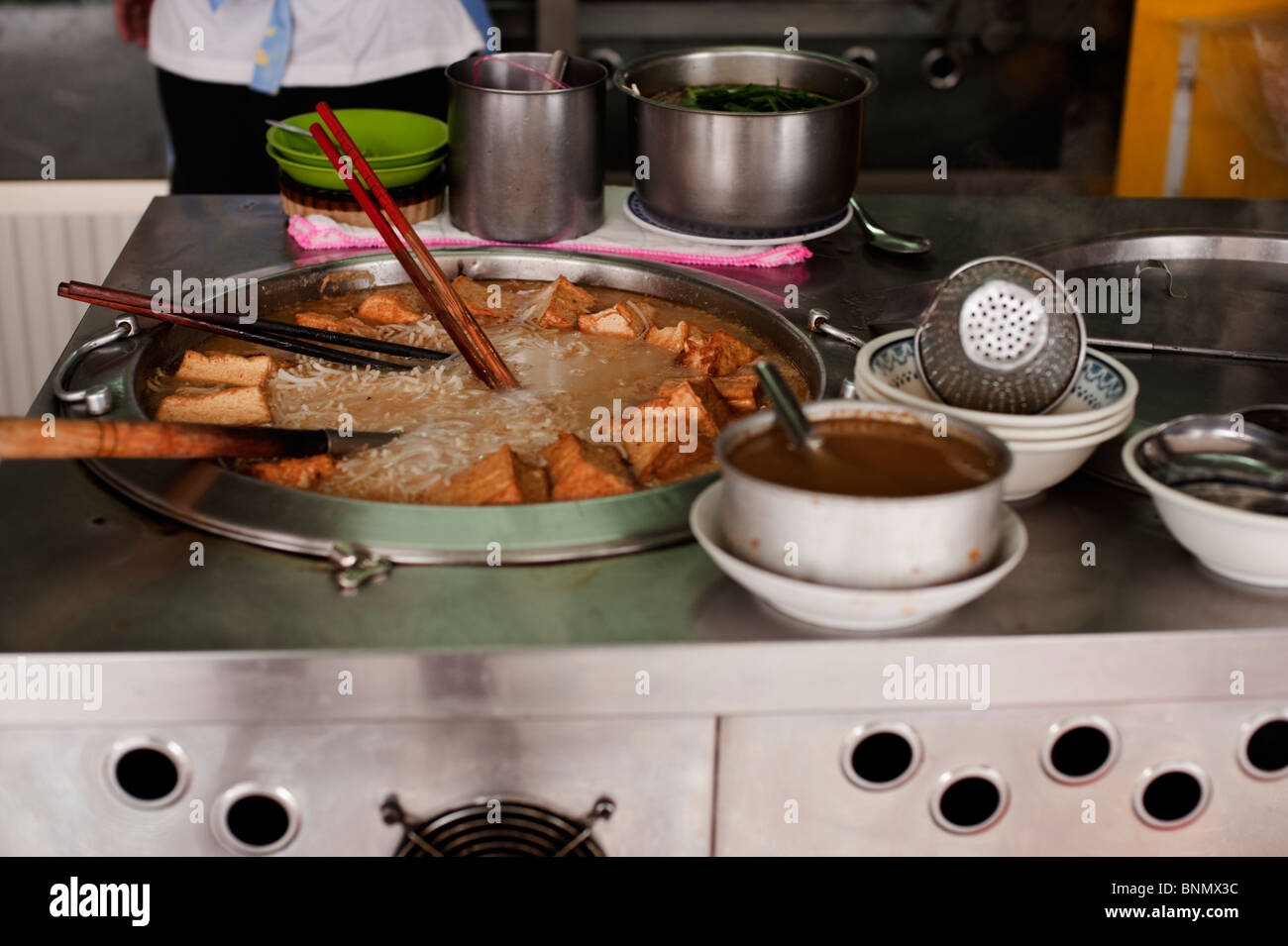Deep fried tofu served as a hotpot dish at a stall at a market in ...