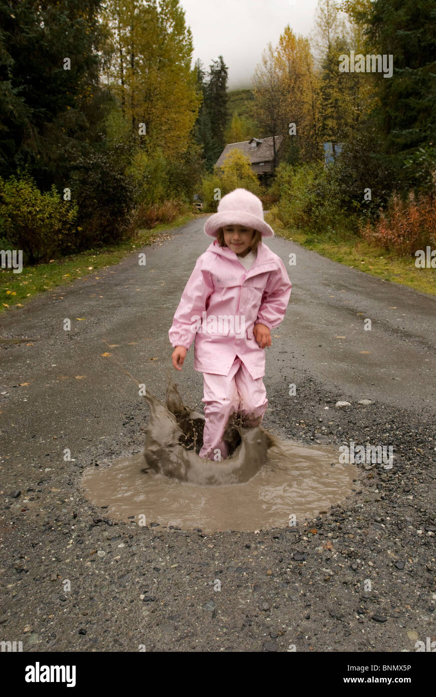 Stepping puddle hi-res stock photography and images - Alamy