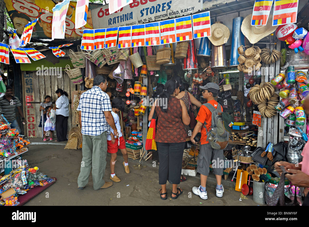 Shops in a street market in Kandy, Sri Lanka during a budh purnima ...