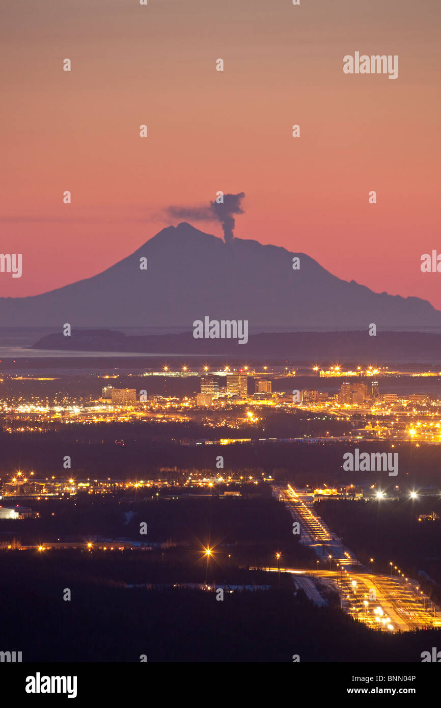 View of minor eruption of ash and steam from Mt. Redoubt with Anchorage ...
