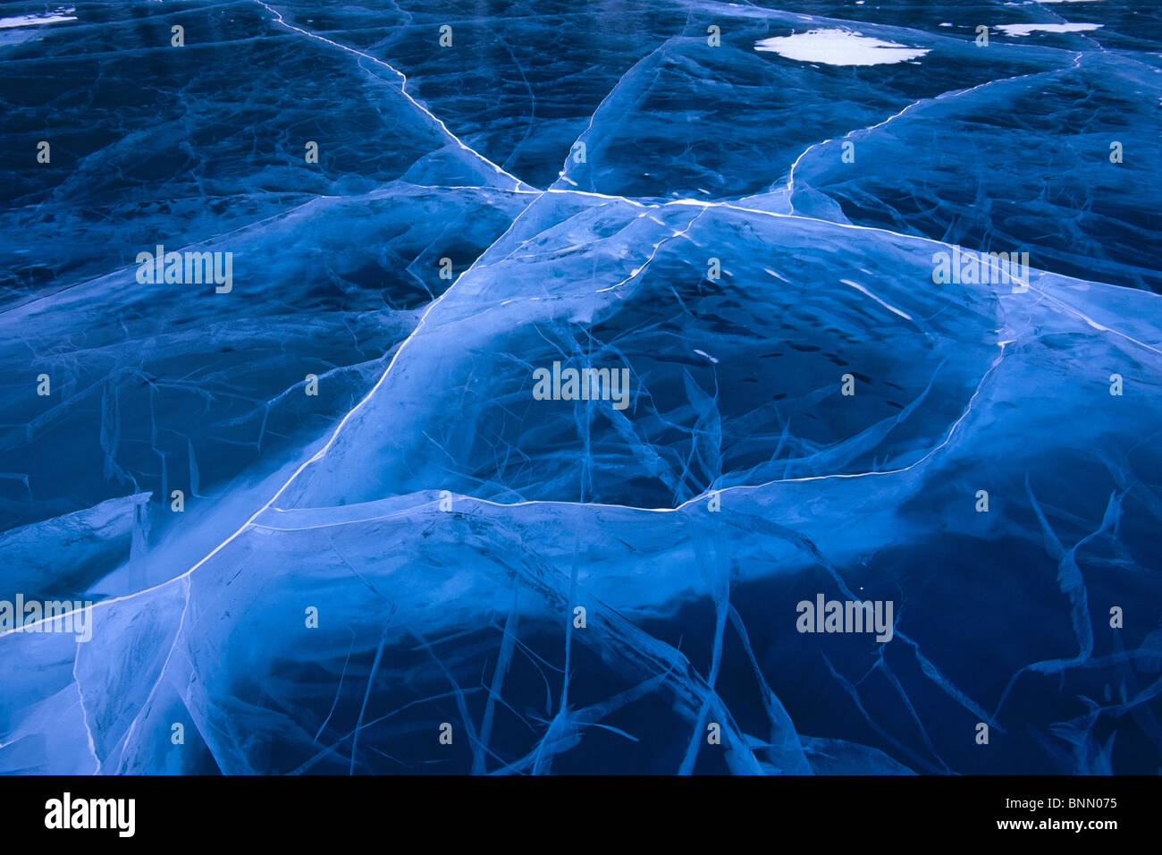 Cracked ice Long Lake along Glenn Hwy Southcentral AK winter close-up ...