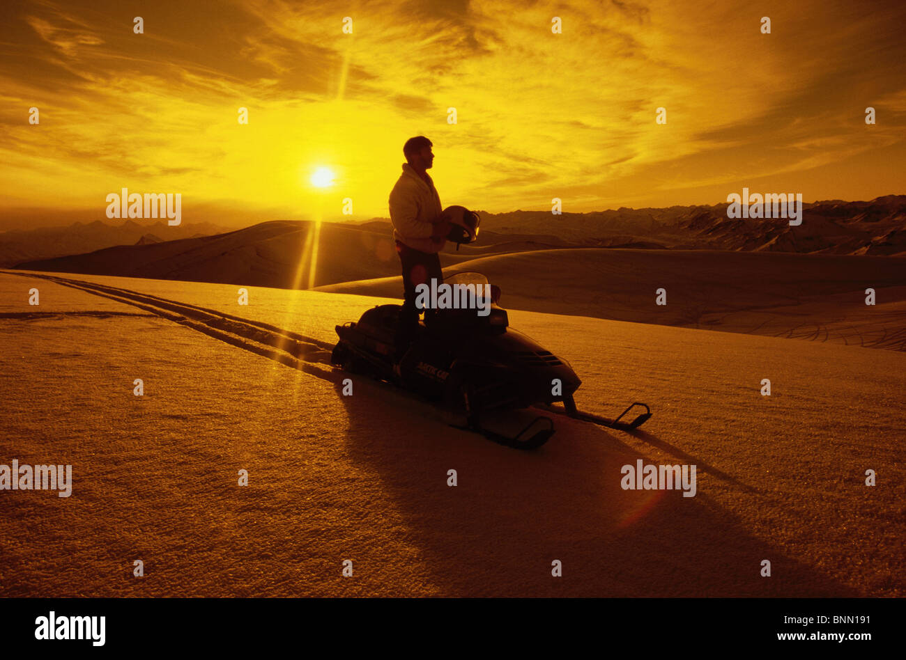 Snowmobiling @ sunset Talkeetna Mtns SC AK winter scenic Stock Photo ...