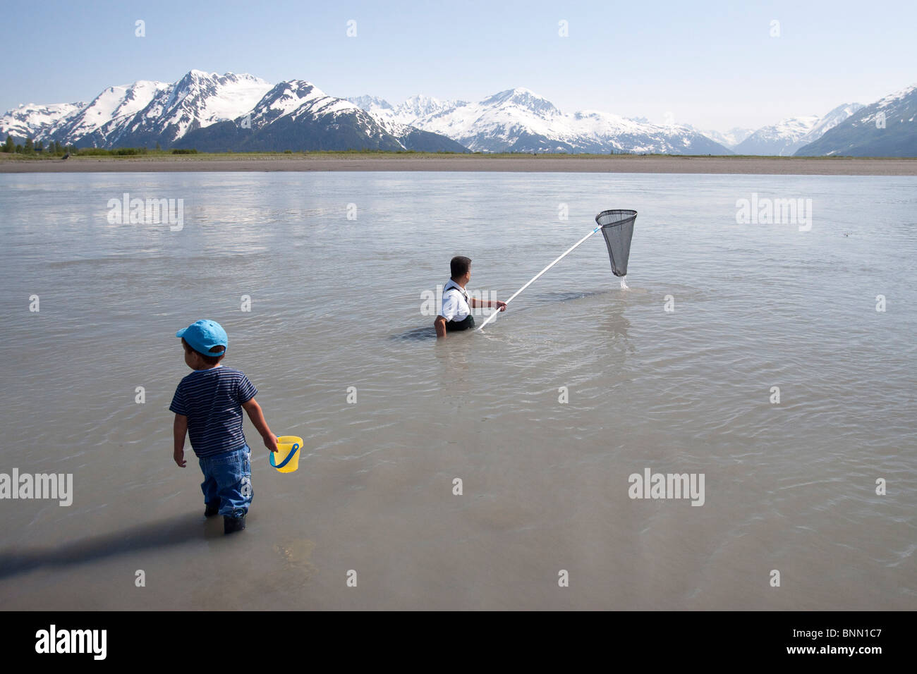 Father and son dipnet fishing for hooligan along Seward Highway, Alaska ...
