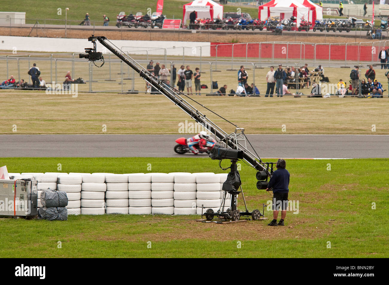 Cameraman Operating a Boom Camera at Silverstone Stock Photo - Alamy