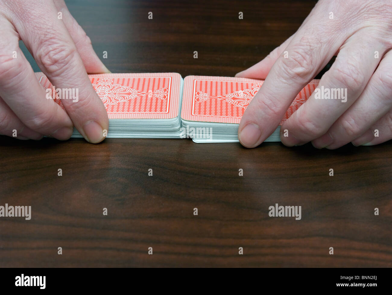 hands shuffling deck of cards Stock Photo - Alamy