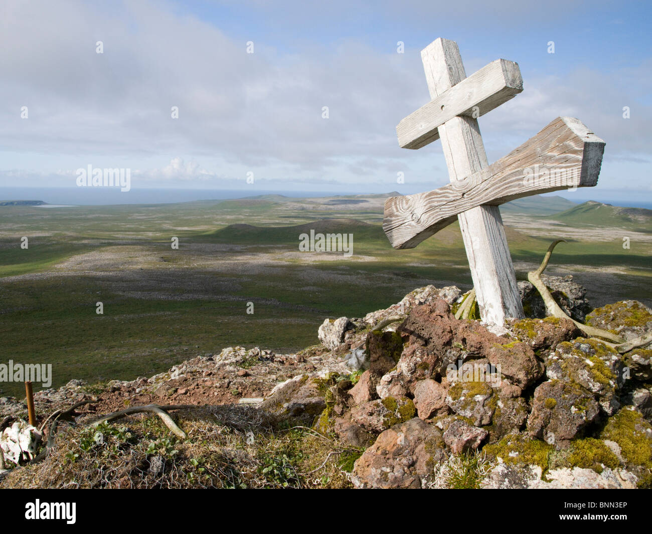 View of a Russian Orthodox cross on a volcanic mountain, St Paul Island ...