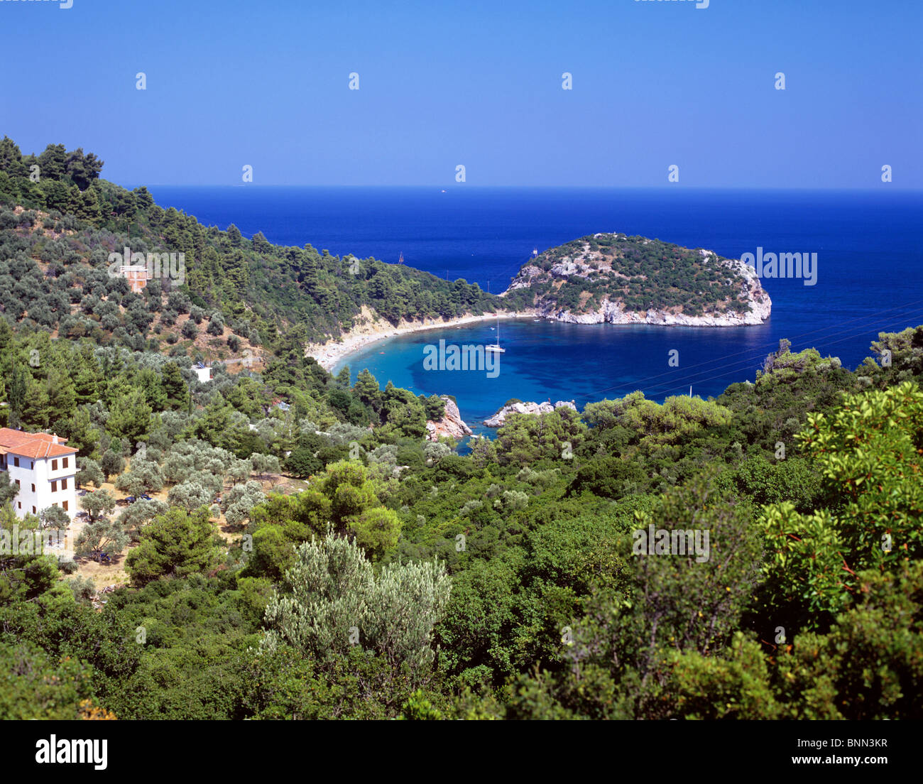 View of beautiful Stafilos beach on the islands south coast near ...