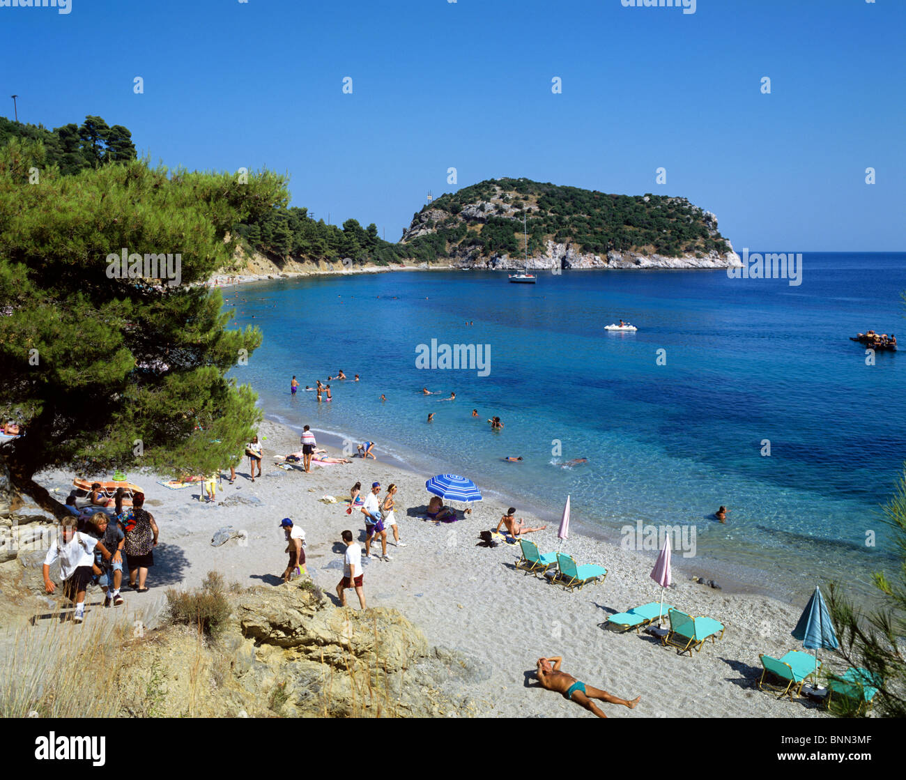 View of beautiful Stafilos beach on the islands south coast near ...