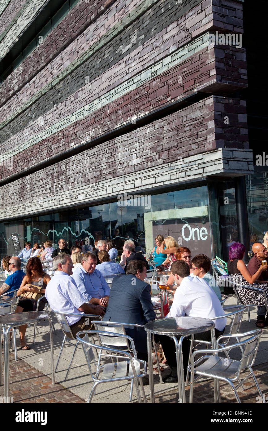 Customers dining and drinking in front of One Café Bar during the 2010 ...