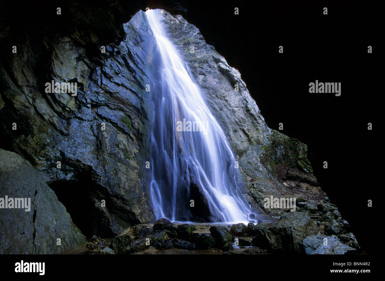 Switzerland canton Neuenburg Val de Travers Rousseau cave waterfall ...