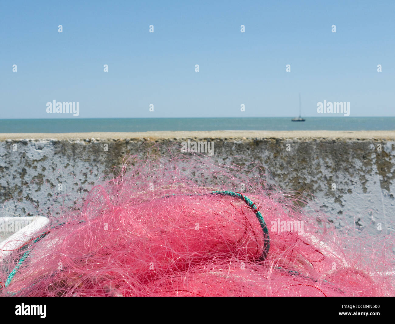 Red fishing line on a beach in the South of France Stock Photo - Alamy