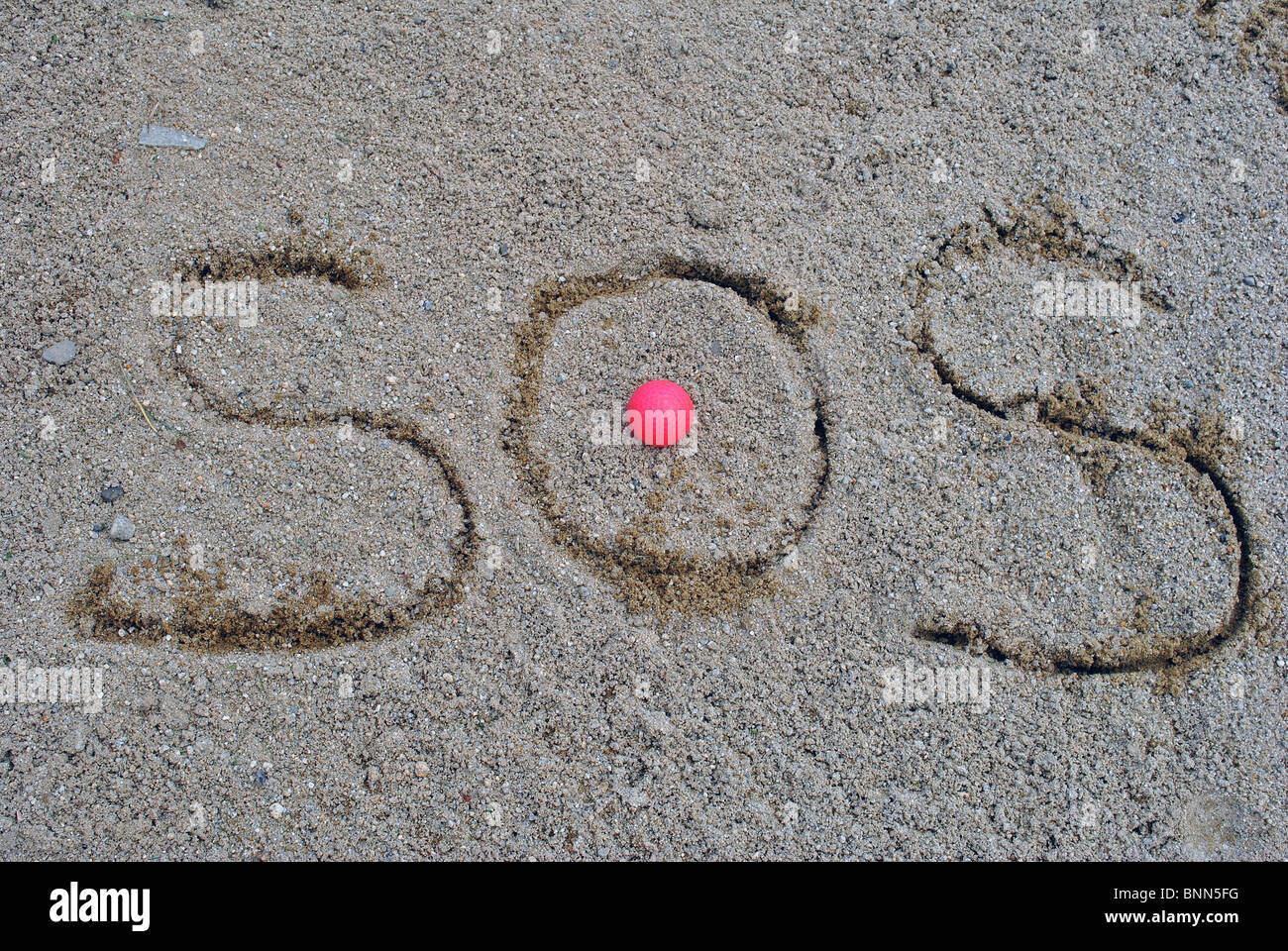s o s written in the sand Stock Photo - Alamy