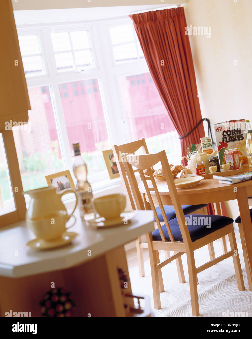 Kitchen with breakfast set Stock Photo - Alamy