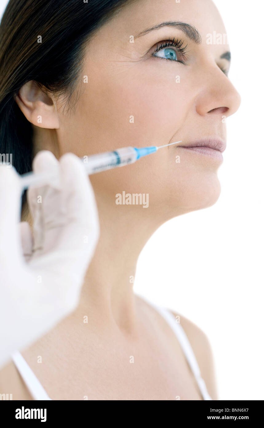 Injections botox woman having hi-res stock photography and images - Alamy