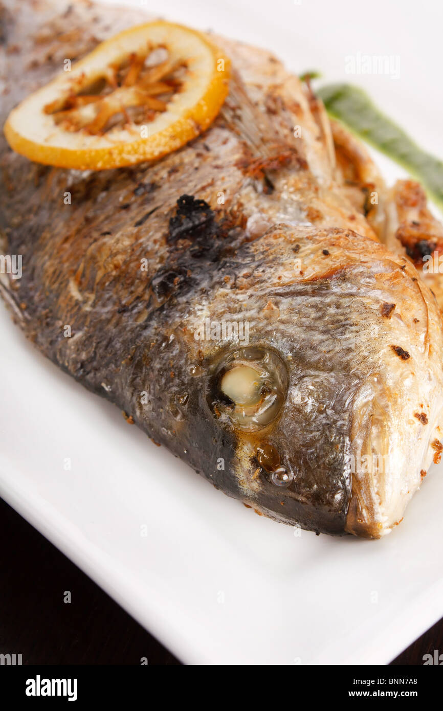 fish with lemon Stock Photo - Alamy