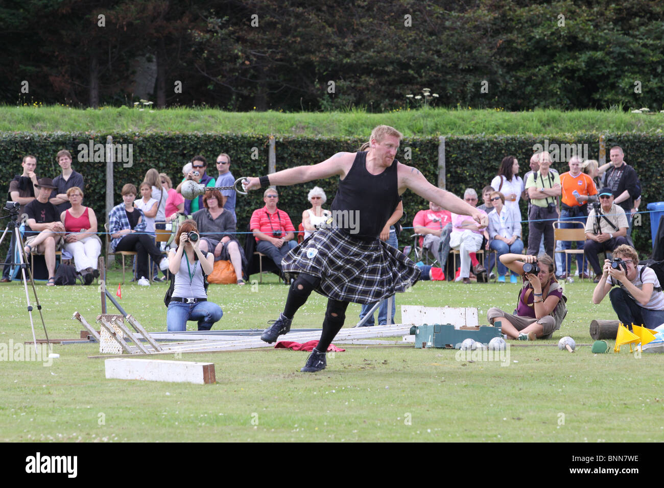 Weight throwing highland games St Andrews Scotland 2010 Stock Photo - Alamy
