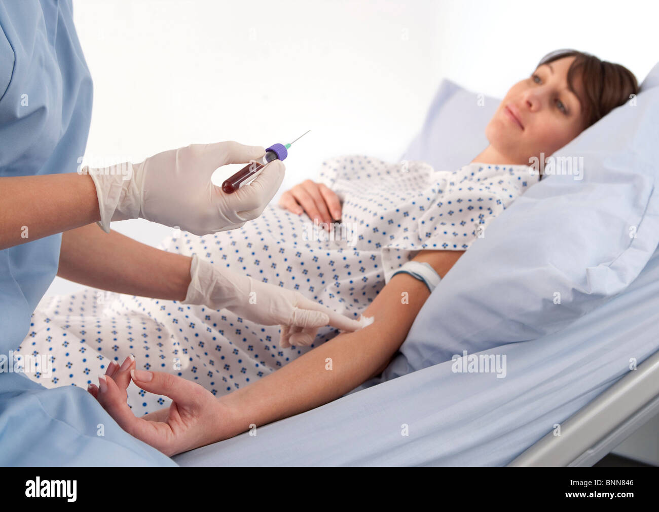Taking blood sample Stock Photo - Alamy