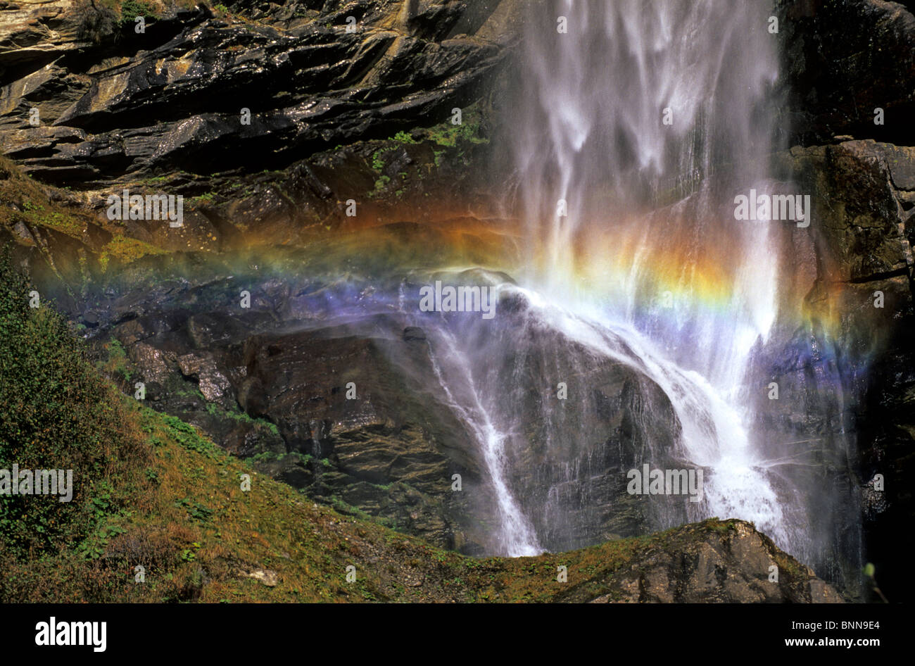 Valley of Saas waterfall mountain brook rainbow near Saas-Balen body of ...