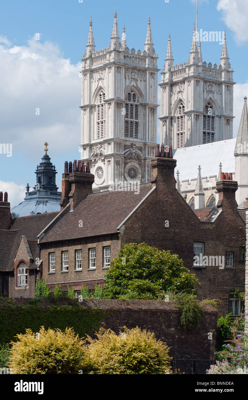 Westminster abbey seen over the rooftops of old Victorian houses ...