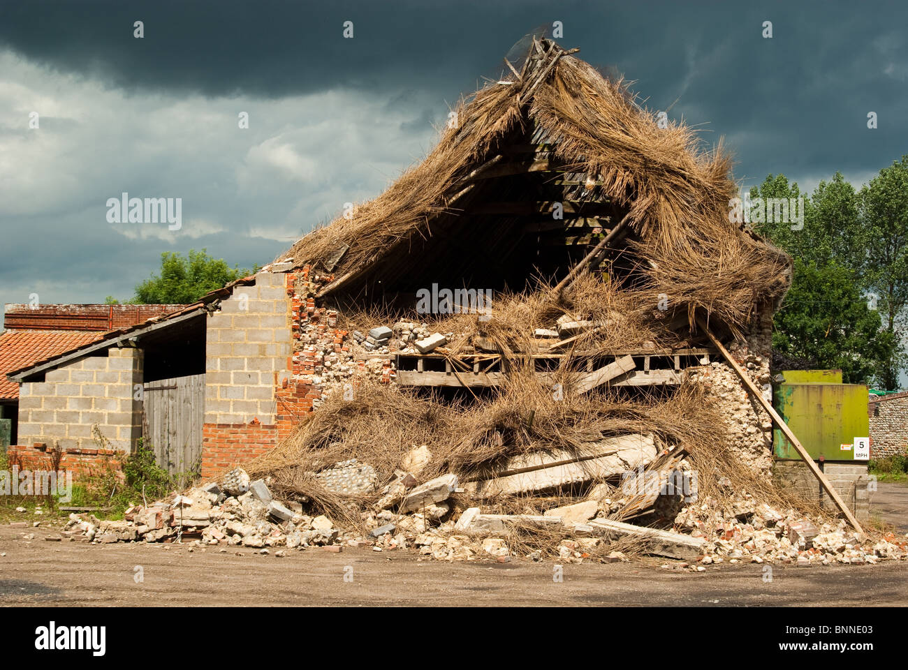 storm damaged thatch on farm barn Stock Photo - Alamy