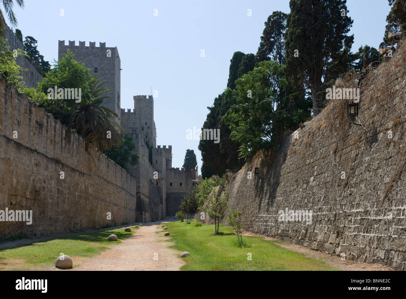 Medieval moat round the walls of the Old Town with the Palace of the ...