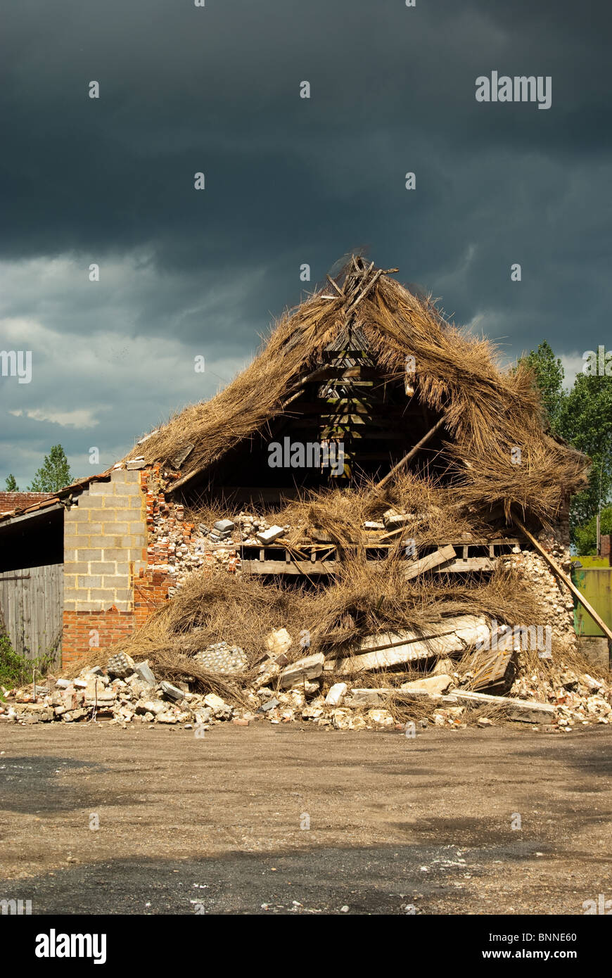 storm damaged thatch on farm barn Stock Photo - Alamy