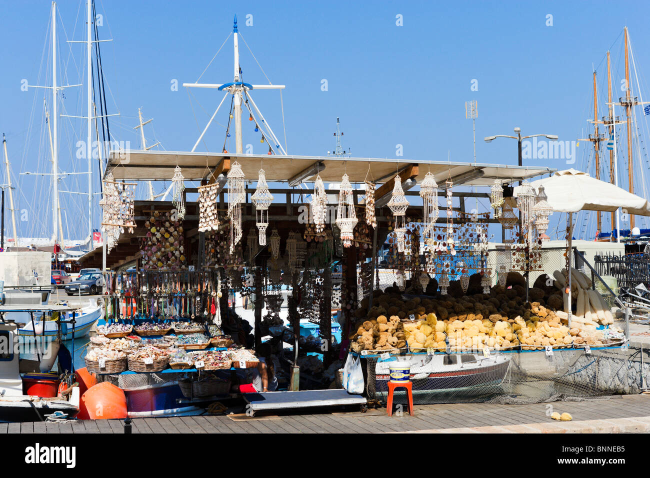 Boat moored in the harbour selling sponges and souvenirs, Rhodes Town ...