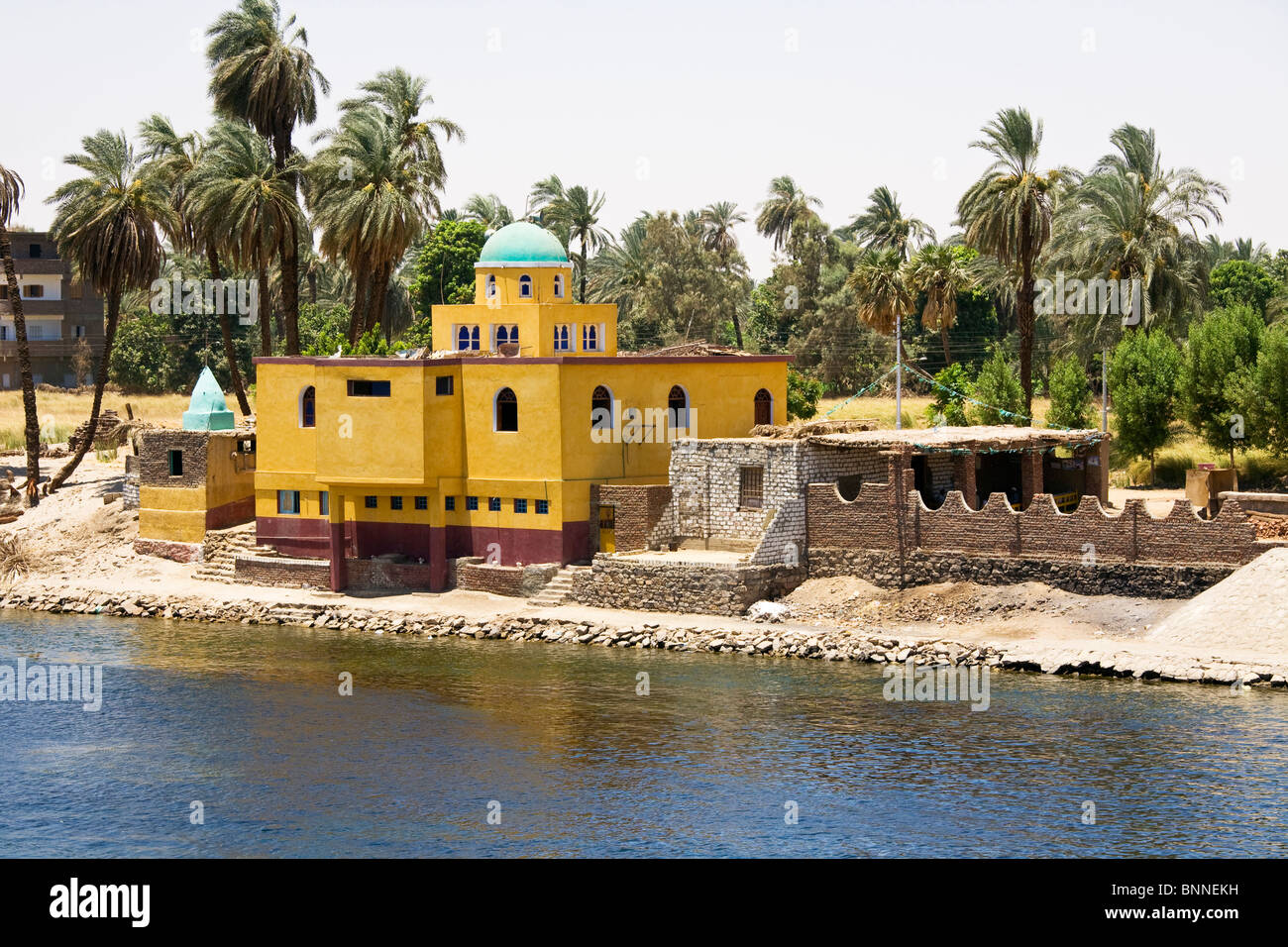 Mosque on the river Nile Stock Photo - Alamy