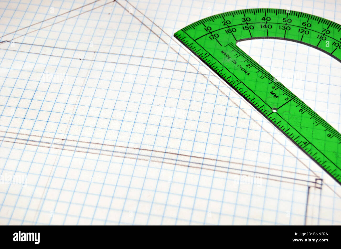 Rough sketch of house Floor Plans on grid paper with green ruler Stock ...