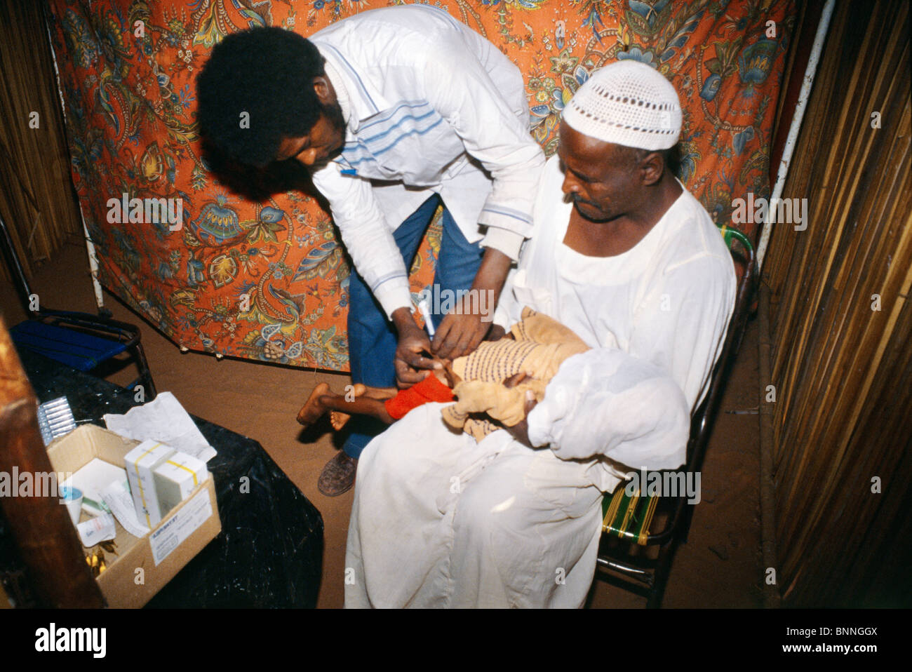 Refugee camp doctor hi-res stock photography and images - Alamy
