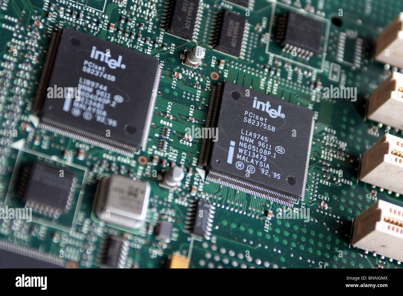 Two Intel PCI CPU controllers on a Dell computer system board Stock ...