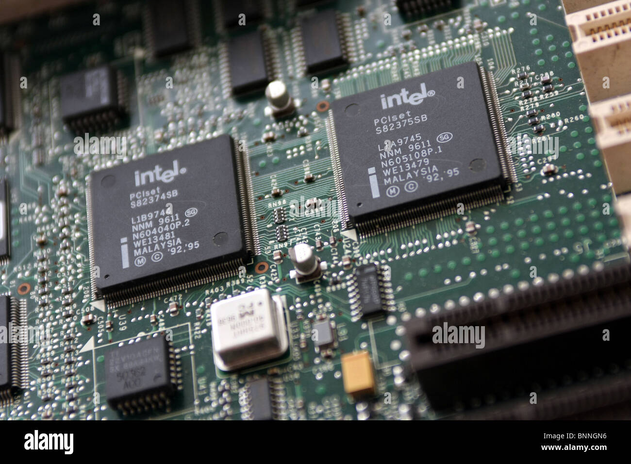 Two Intel PCI CPU controllers on a Dell computer system board Stock ...