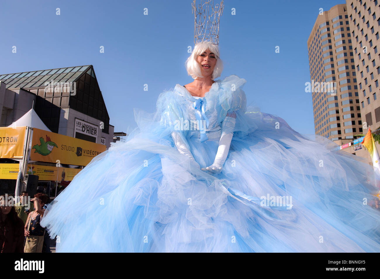 Stilt artist dressed as a fairy photographed during the Just for Laughs ...