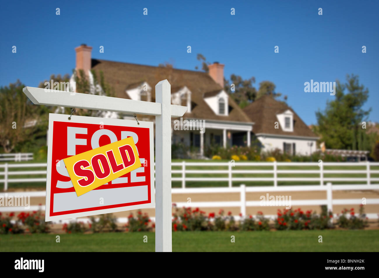 Sold Home For Sale Real Estate Sign in Front of New House Stock Photo ...