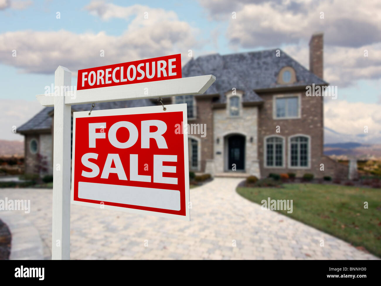Foreclosure Home For Sale Sign and House with Dramatic Sky Background ...