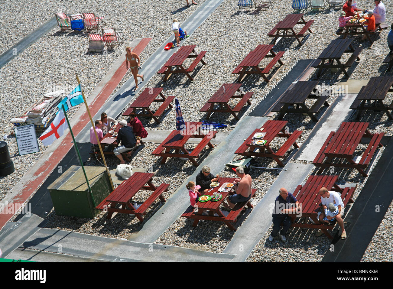 Cafe tables on the beach at Beer, Devon, England, UK Stock Photo - Alamy