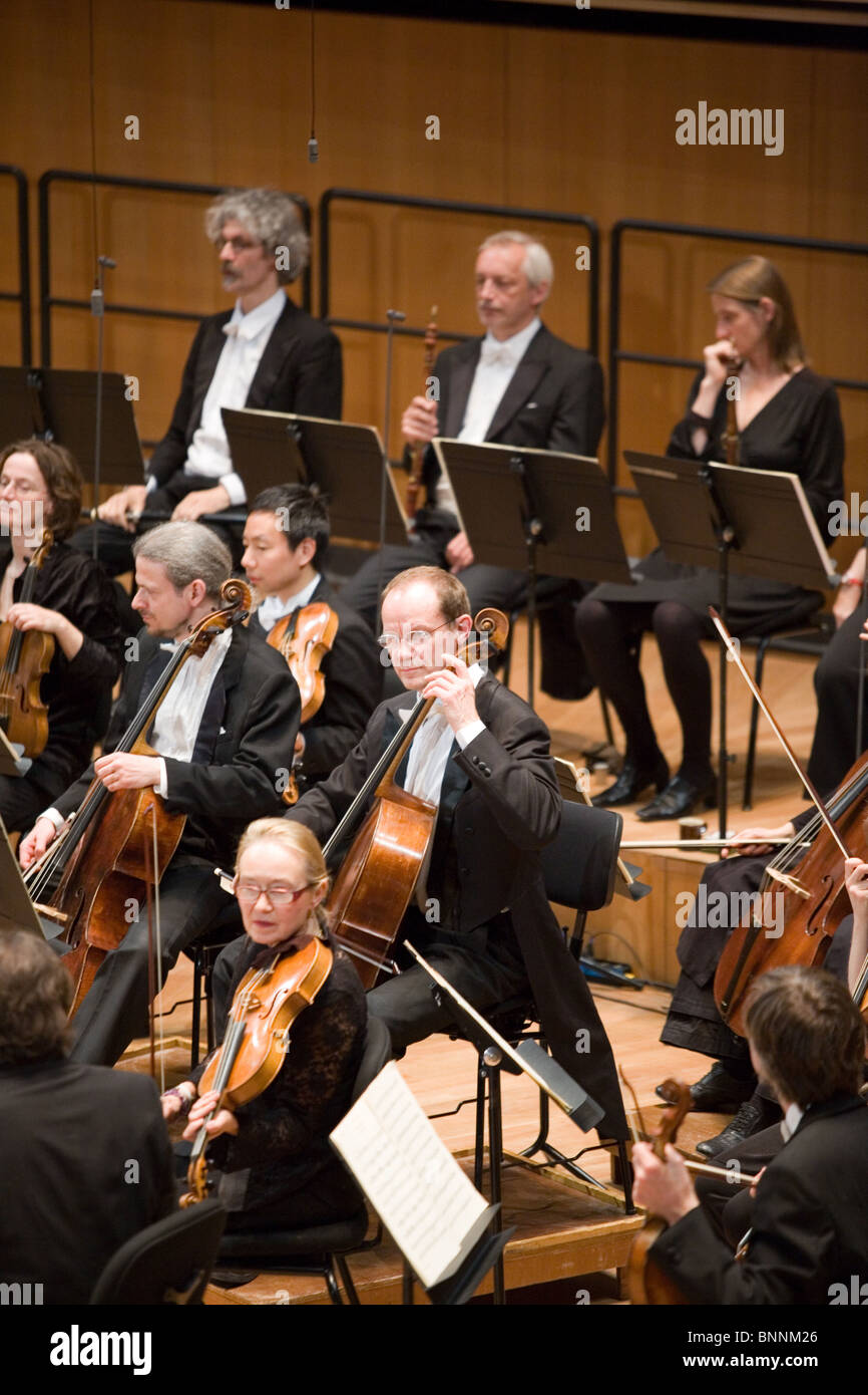 Members of the Anima Eterna Philharmonic Orchestra perform on stage at ...