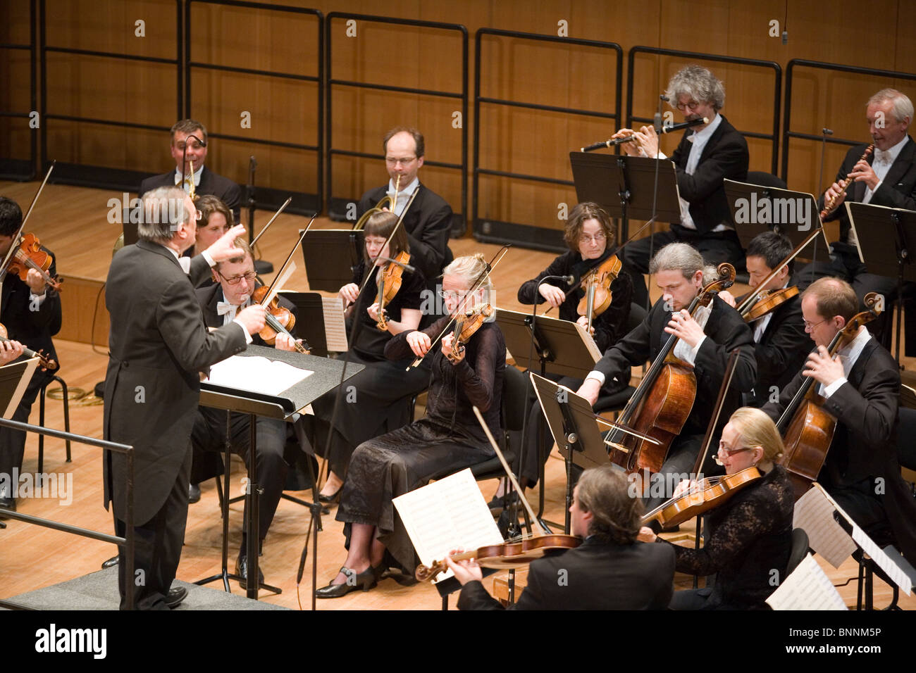 Members of the Anima Eterna Philharmonic Orchestra perform on stage at ...