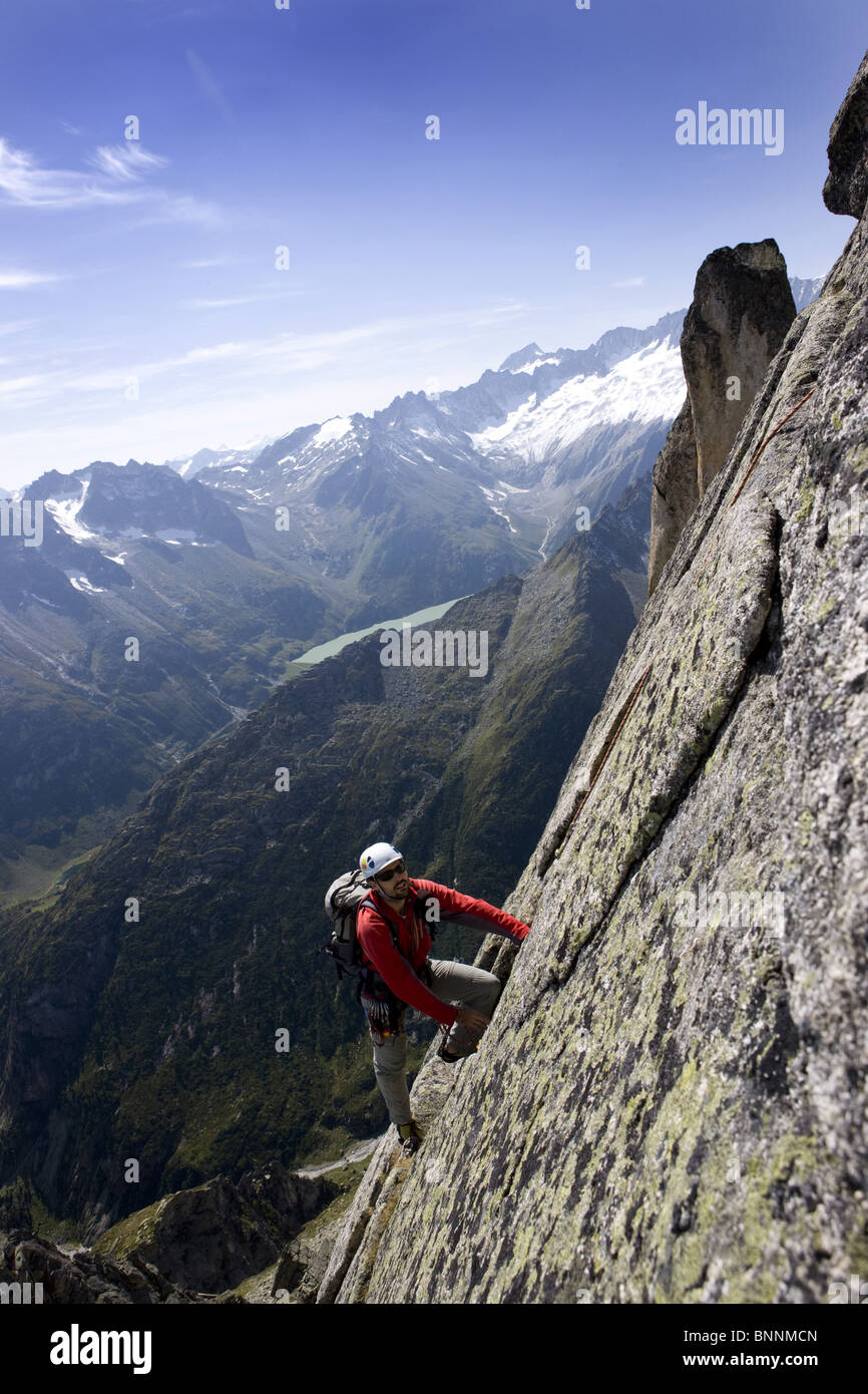 Switzerland swiss climbing Salbit cliff wall Göscheneralp man rope ...