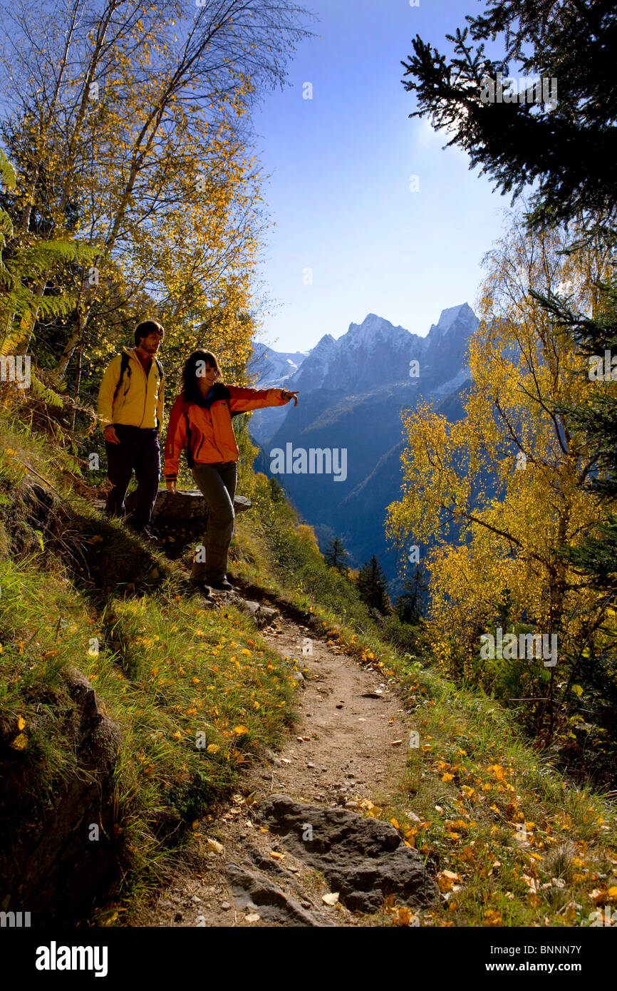 Switzerland swiss walk hike pair couple two autumn view trees show ...