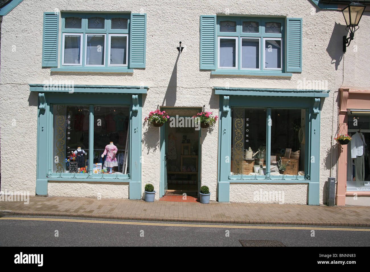 Shops front on Fore Street in Beer, Devon, England, UK Stock Photo - Alamy