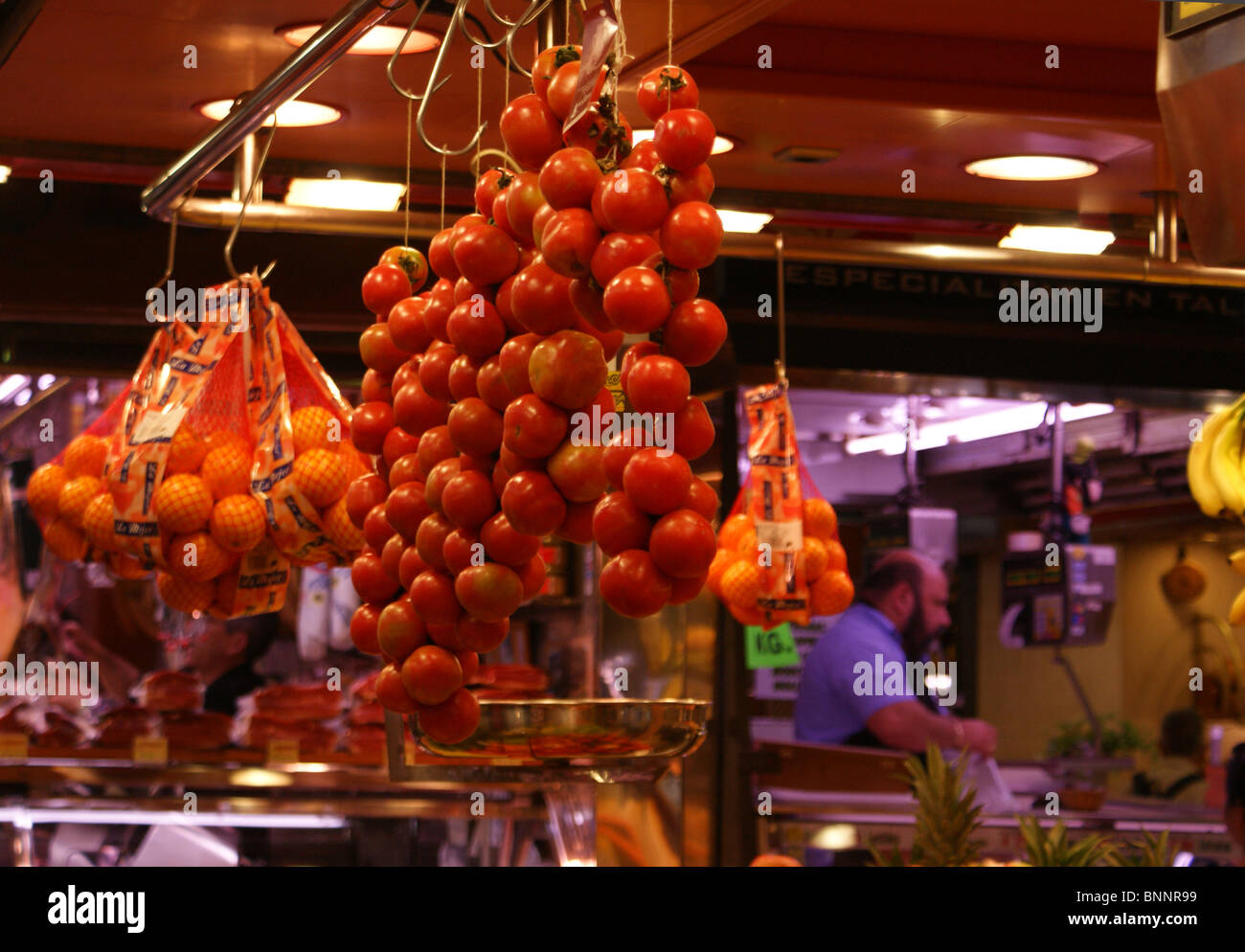 Market food trader tomatoes hi-res stock photography and images - Alamy