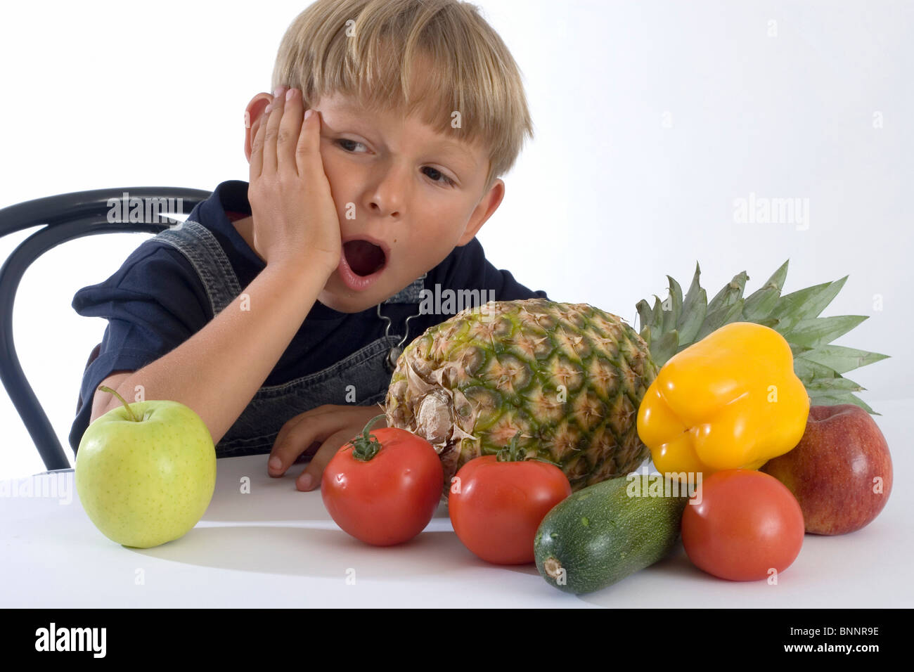 Boy child boy food food feeding food eatings healthy health disinterest ...