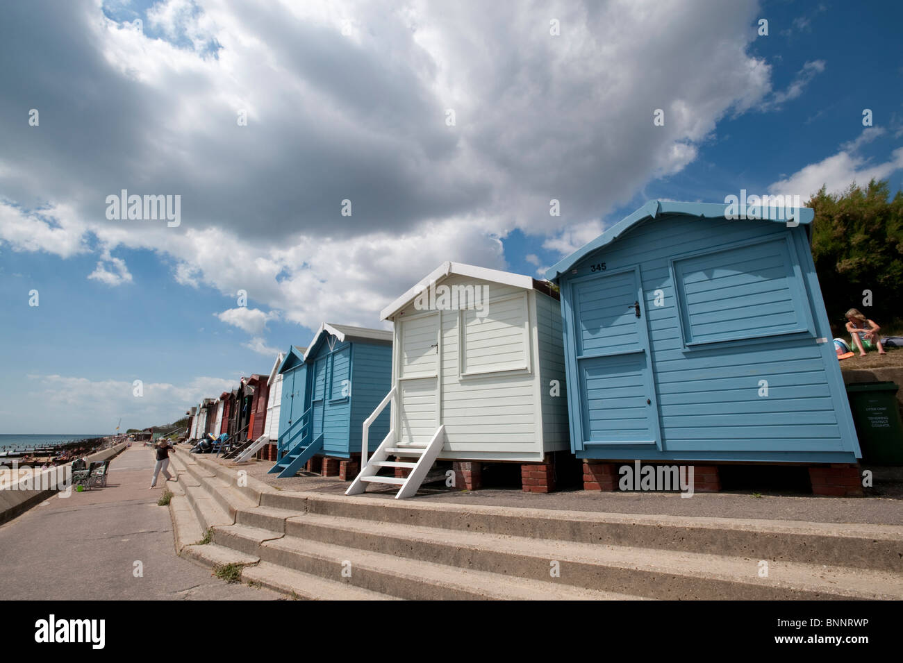 Brightly painted beach huts at Frinton-on-Sea, Essex Stock Photo - Alamy