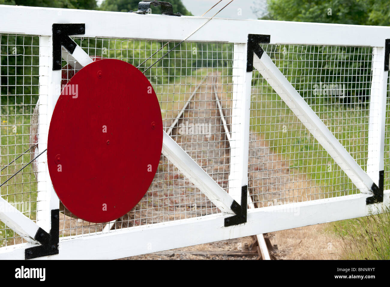 Level crossing gate Stock Photo - Alamy