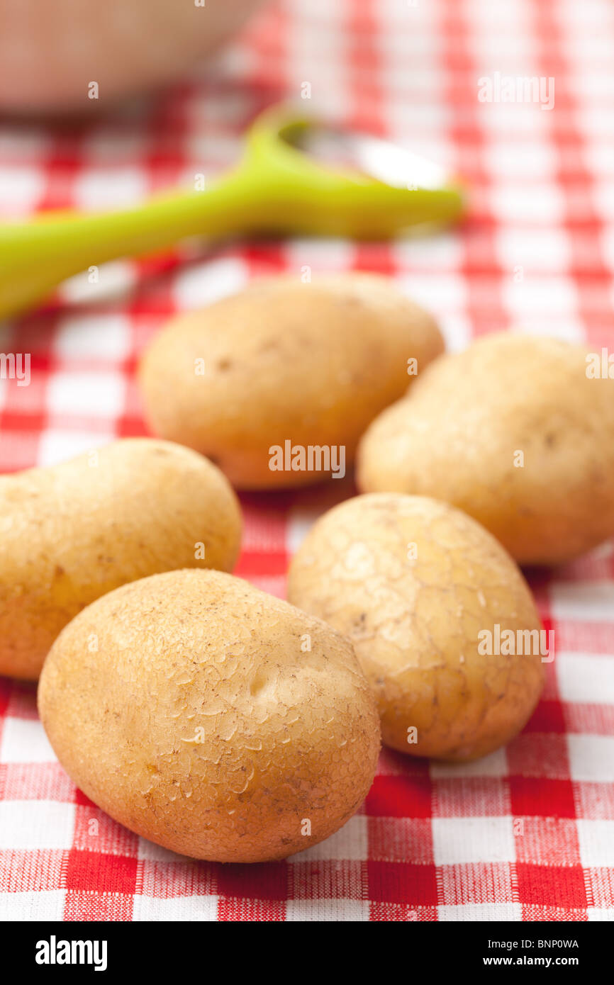 fresh potatoes on picnic table Stock Photo - Alamy