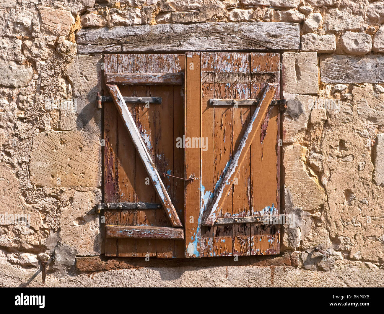 Old closed wooden window shutters - France Stock Photo - Alamy